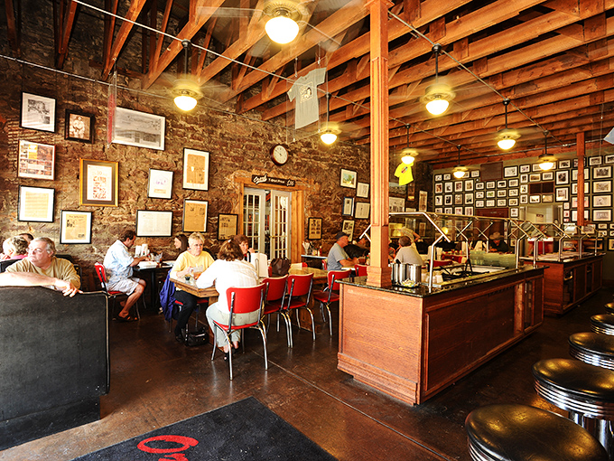 Where locals and travelers break bread together under exposed beams, surrounded by framed memories of Jasper's past&mdash;this is community served family-style.