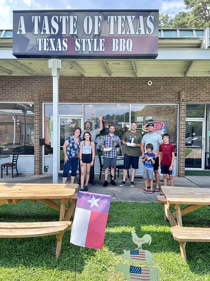 Happy customers outside their barbecue mecca. That's the look of people who've just discovered something too good to keep secret.