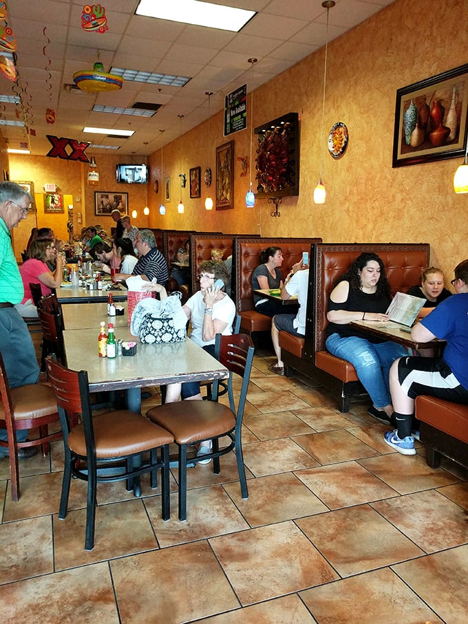 The true measure of a restaurant: locals filling every table, menus open, conversations flowing as freely as the salsa.