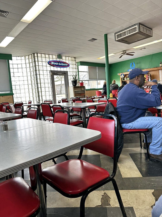No designer lighting or curated playlist here&mdash;just honest tables, chairs, and the symphony of satisfied diners enjoying the real thing.