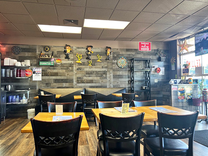 Modern meets traditional in this dining space where wooden tables await your elbows and the walls hold stories of meals past.