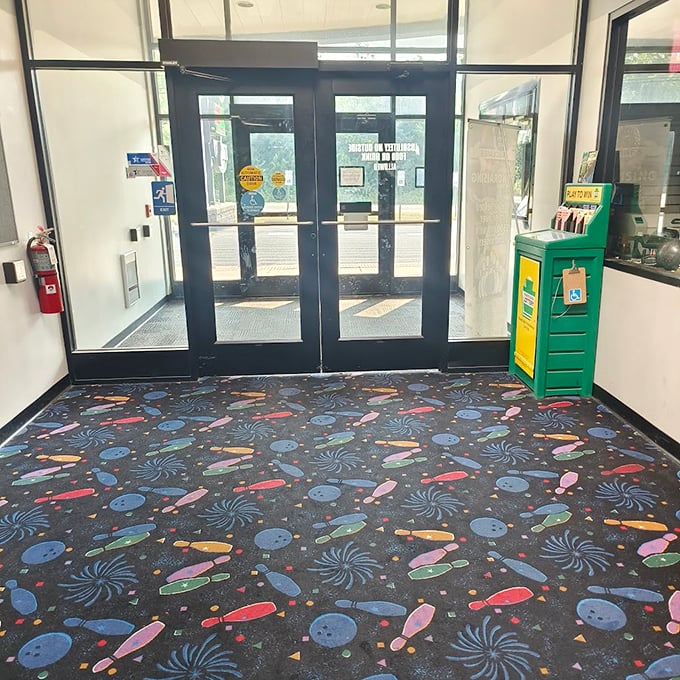 That classic bowling alley carpet&mdash;designed specifically so spilled nachos and soda never show&mdash;leads to doors that have welcomed champions and beginners alike.