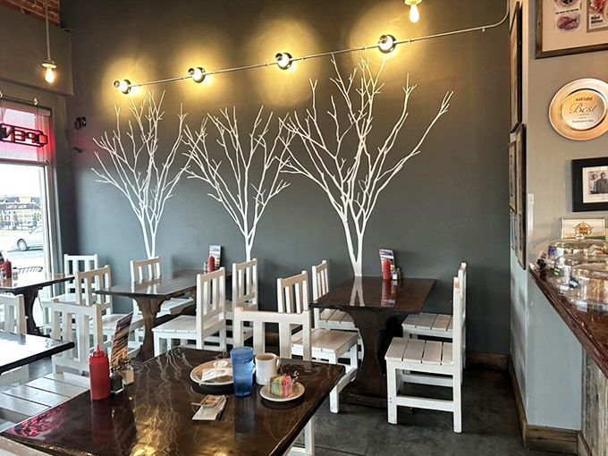 White tree silhouettes against gray walls create a winter wonderland vibe. Who knew forest aesthetics paired so well with pastrami?