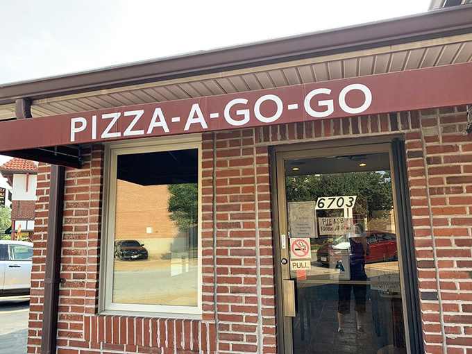 The modest entrance promises no frills, just fulfillment &ndash; a doorway to pizza nirvana that locals have been walking through for generations.