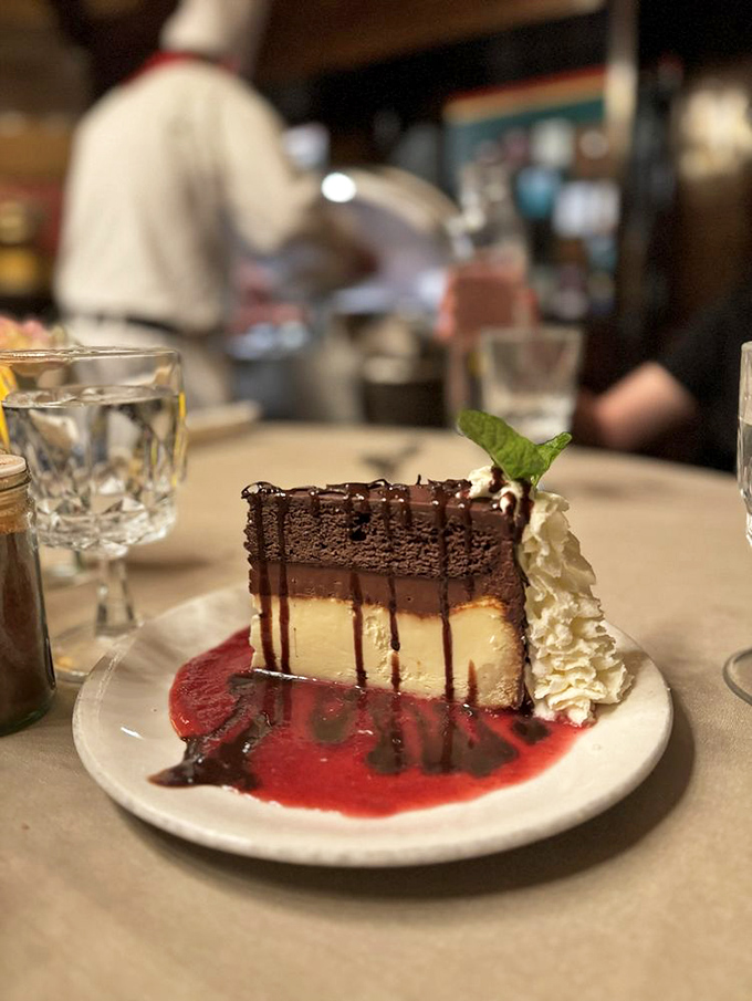 A slice of Fantasy Cake that lives up to its name&mdash;layers of chocolate and cheesecake that would make Willy Wonka weep with joy.