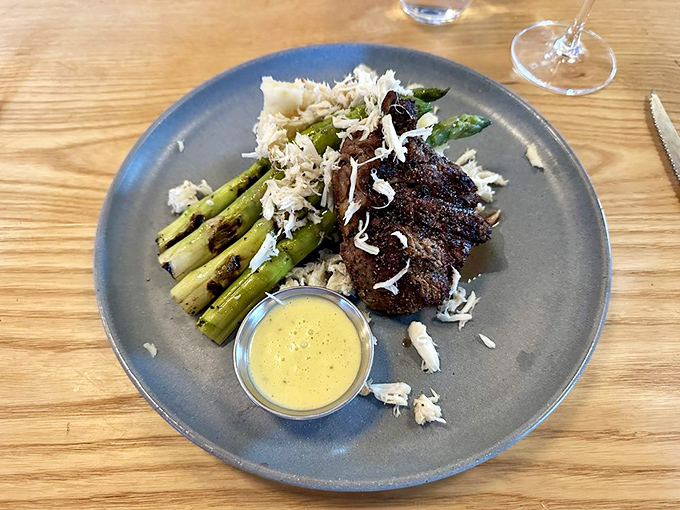 Steak and asparagus performing a perfectly choreographed duet with a supporting cast of delicate sauce that deserves its own standing ovation.