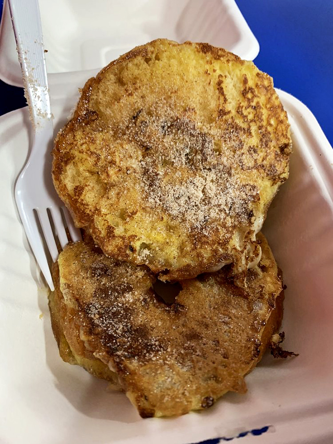 A dozen donuts in their natural habitat&mdash;a box ready for sharing, though you'll be tempted to claim territorial rights over the entire collection.