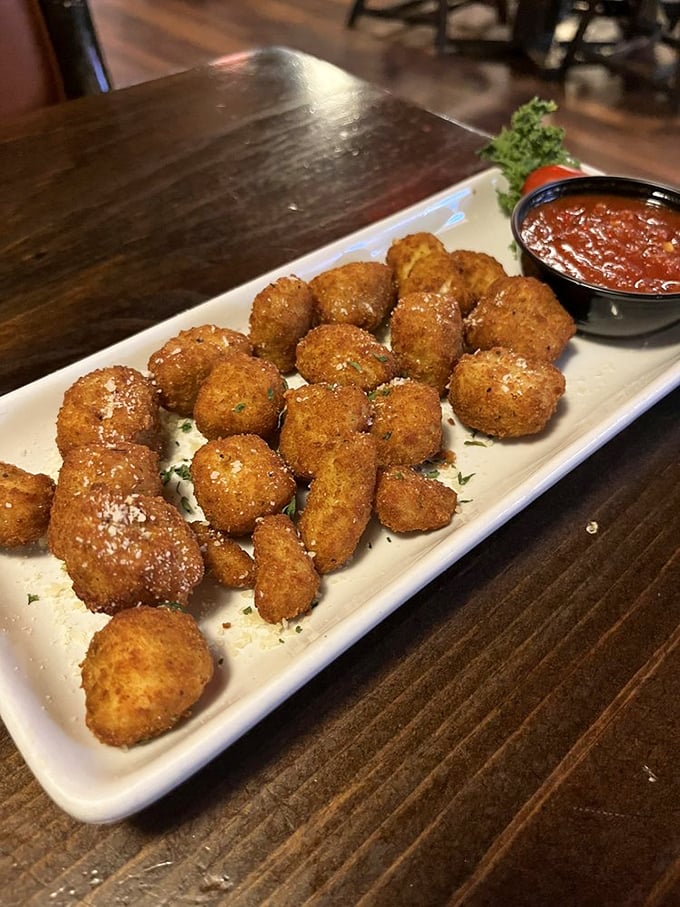 The outdoor deck: where summer evenings transform into memories, all under the watchful eye of a Landshark umbrella and Pennsylvania skies.