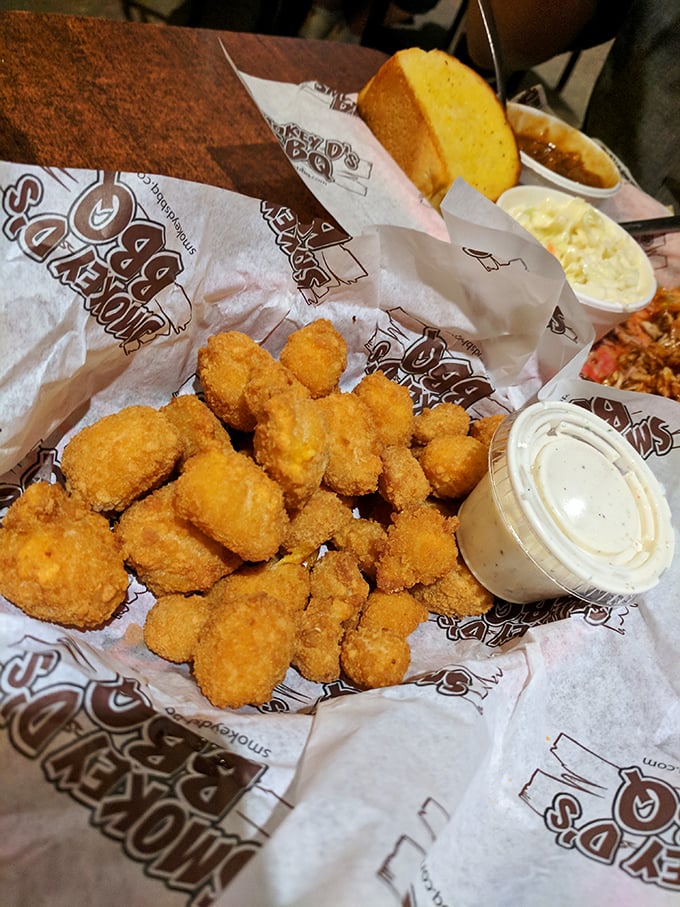 Fried cheese curds that squeak with Wisconsin pride but have found a perfect home alongside Iowa's finest smoked meats.