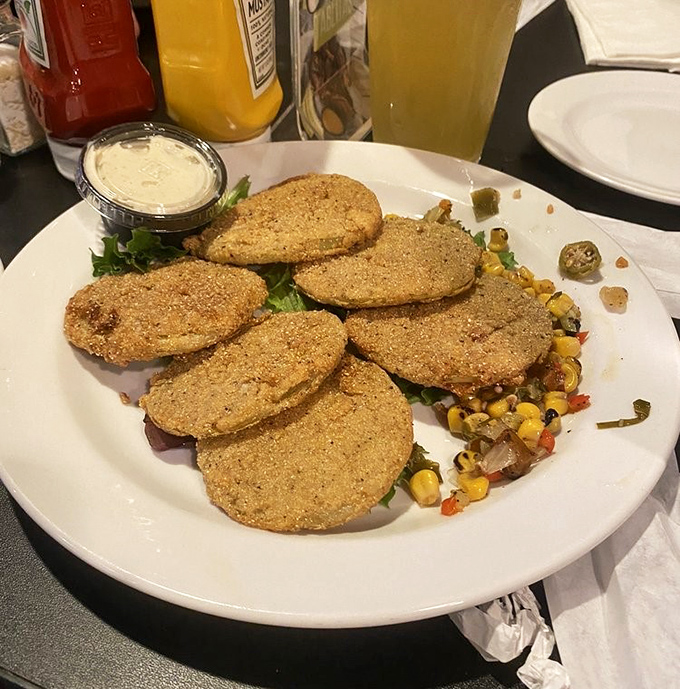 Fried green tomatoes with corn relish &ndash; a Southern classic executed with respect and zero pretension. Tangy, crispy discs of pure Alabama joy.