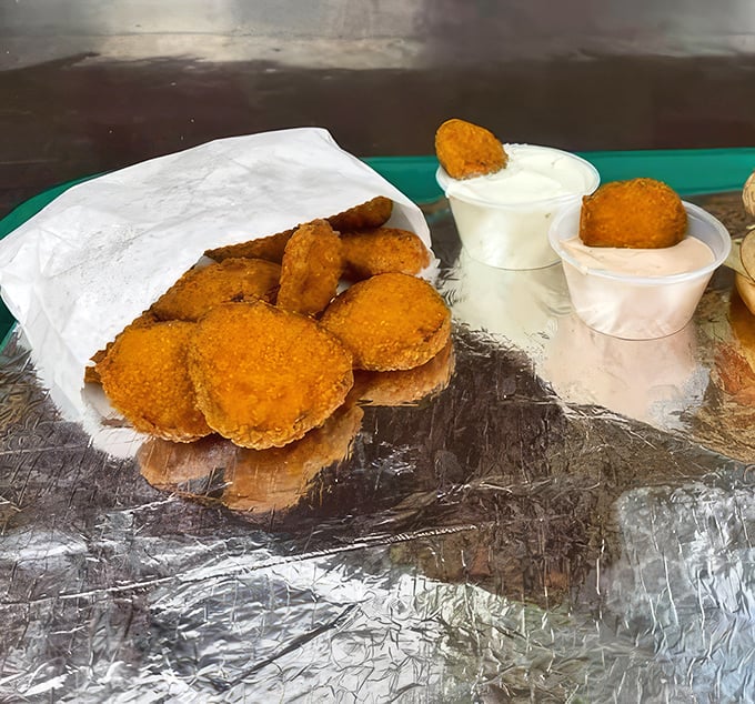 Fried pickles: Where tangy meets crispy in a Southern love story. The perfect opening act before the burger main event.