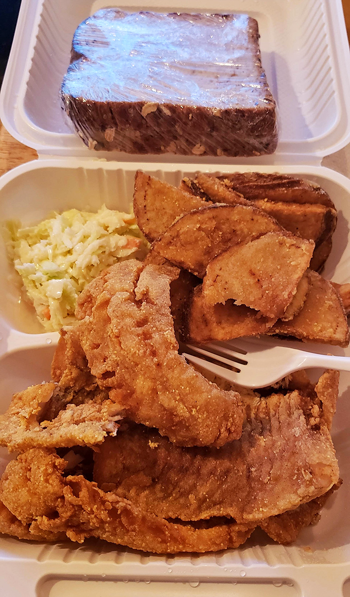 A feast fit for Poseidon himself. The bread says "I'm just here for support," while the fish and sides steal the show.