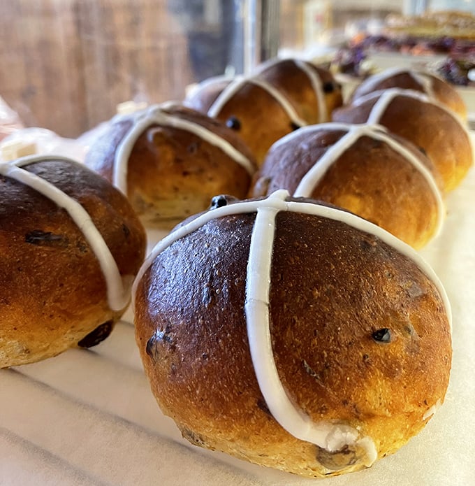 Hot cross buns that would make even the most stoic Englishman weep with joy. Those glossy tops are begging for a schmear of butter.