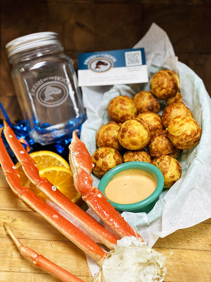 Hush puppies and crab legs—the unexpected duo that works better than most Hollywood co-stars. That dipping sauce deserves its own fan club.
