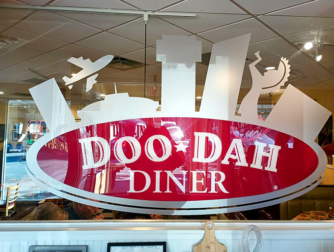 The Doo-Dah logo celebrates Wichita's skyline and spirit. Like Batman's signal, but summoning hungry patrons instead of caped crusaders.