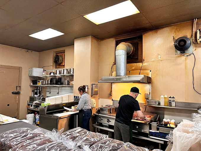The magic happens behind the scenes, where decades of expertise transform brisket into the stuff of sandwich legend.
