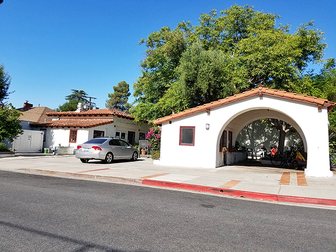 Knead Baking Company's simple white buildings with red trim promise what every great bakery should: nothing fancy outside, magic inside.
