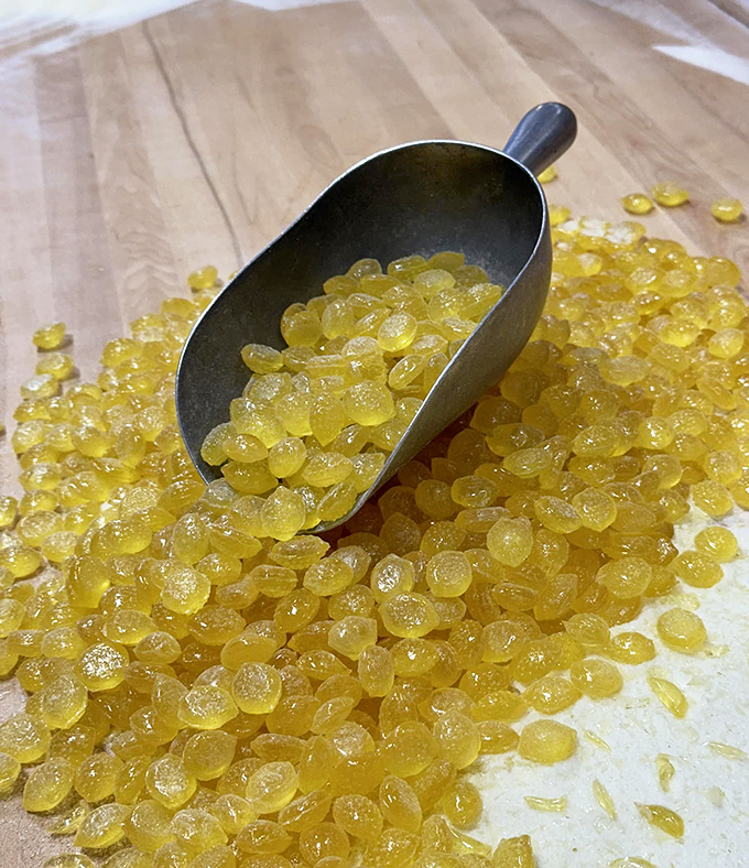 Sunshine captured in candy form—these lemon drops glow like amber jewels, promising a perfect pucker with every pop.