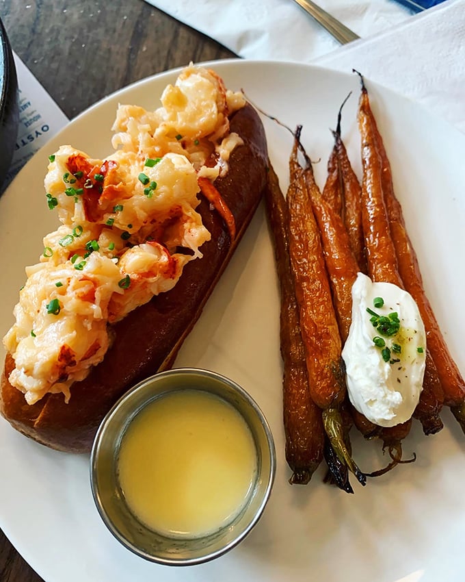 The classic lobster roll gets a sophisticated sidekick of roasted carrots. It's like pairing Sinatra with a smooth bourbon &ndash; timeless and perfect.