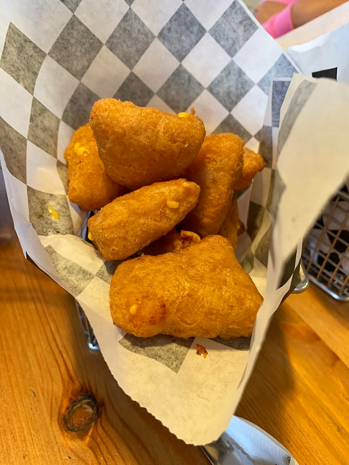 Golden-fried mac and cheese bites—because someone brilliant decided regular mac and cheese wasn't quite indulgent enough. Thank that person immediately.