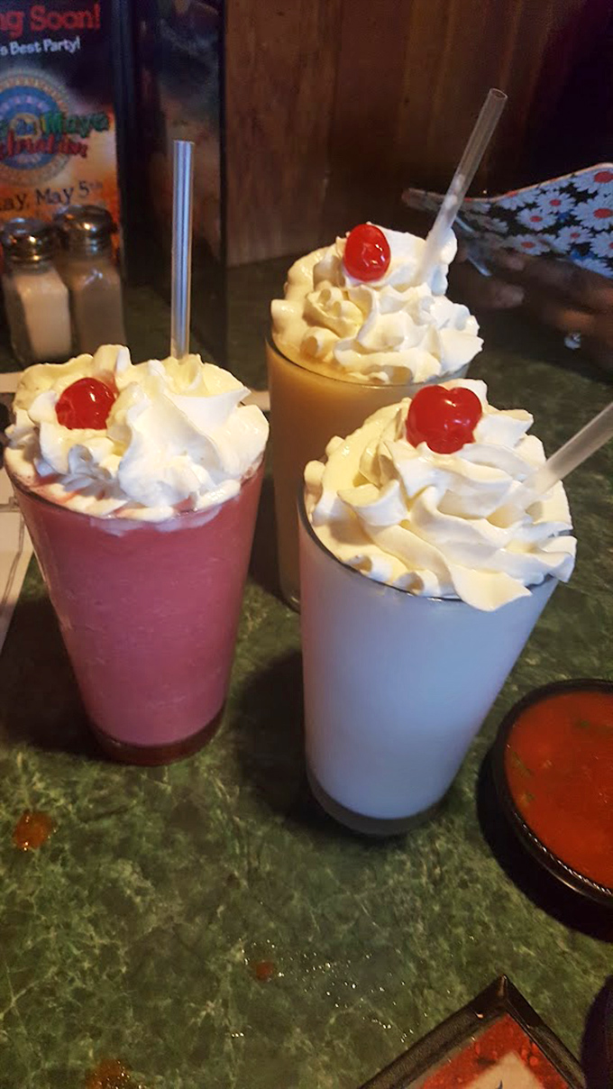 Colorful, whipped cream-topped milkshakes that look like they escaped from a 1950s soda fountain add a sweet finale to your Mexican feast.