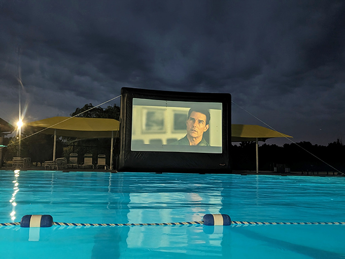 Dive-in movies elevate summer nights from ordinary to magical, combining two American pastimes: swimming and watching films under the stars.