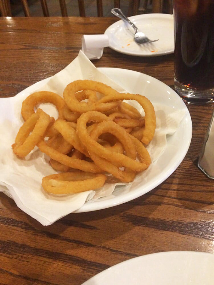 Onion rings that achieve that perfect balance of crisp exterior and sweet, tender interior&mdash;like edible jewelry for your plate.