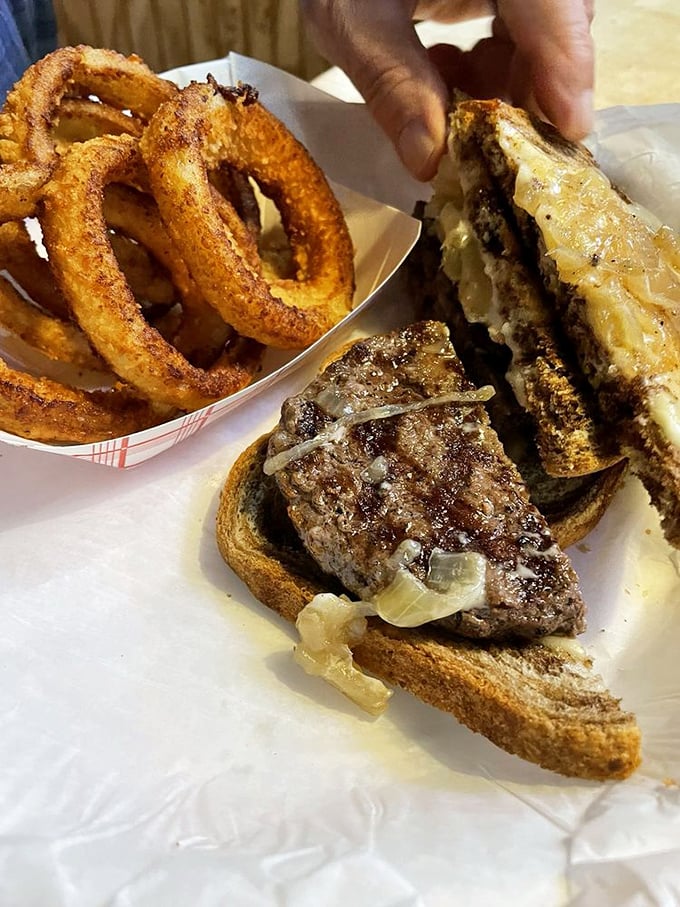 The patty melt: where grilled beef and melted cheese meet toasted bread in a romance that's lasted generations.