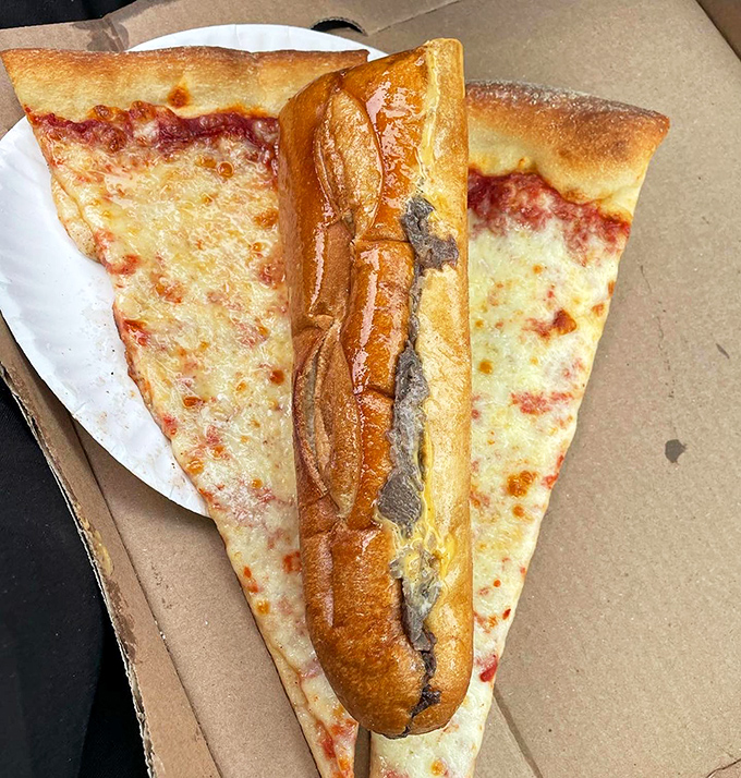 The infamous "Philly Taco"&mdash;a cheesesteak wrapped in pizza&mdash;combining two perfect foods into one heart-stopping creation that cardiologists fear and food lovers revere.