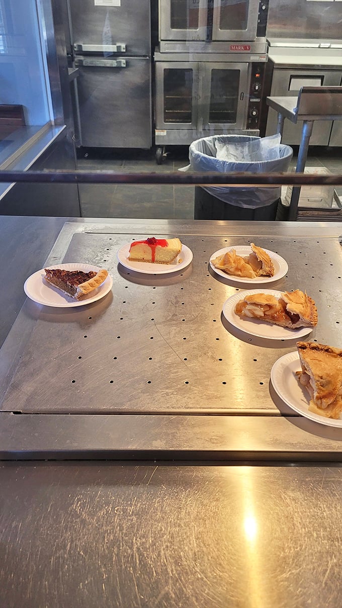 Pie lineup that would make a state fair judge weep with joy. Apple, cherry, and is that peach? Decisions were never so deliciously difficult.