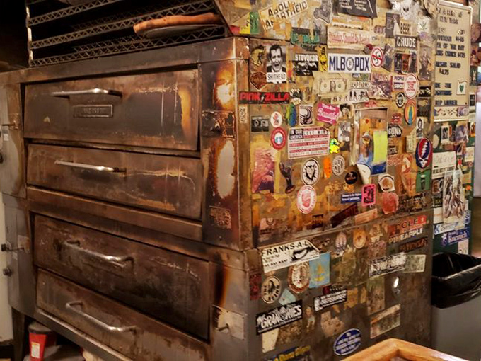 The vintage pizza oven has probably seen more New York-style pies than most Manhattan natives, and it's still going strong.
