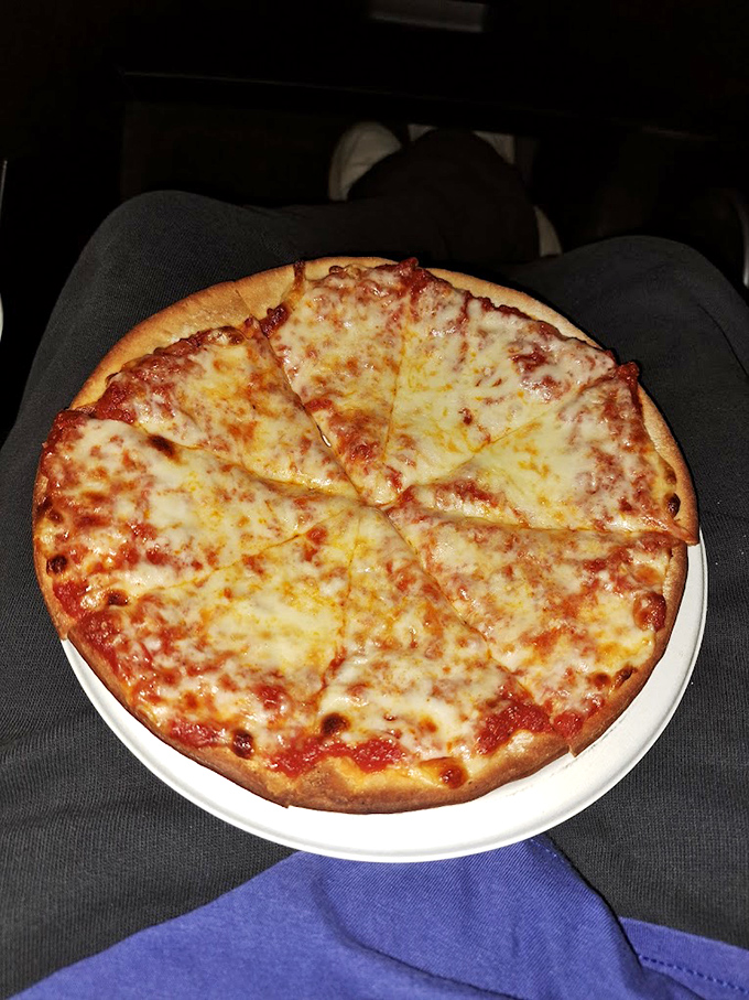 Pizza that doesn't try to be artisanal or pretentious. Just honest-to-goodness cheese, sauce, and dough that satisfies that primal pizza craving.