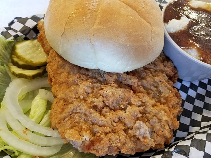 The pork tenderloin sandwich&mdash;a Midwest masterpiece where the meat heroically extends beyond the bun's modest boundaries.
