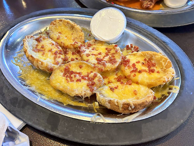 Potato skins that could make an Irishman weep with joy&mdash;crispy vessels delivering the holy trinity of cheese, bacon, and sour cream.