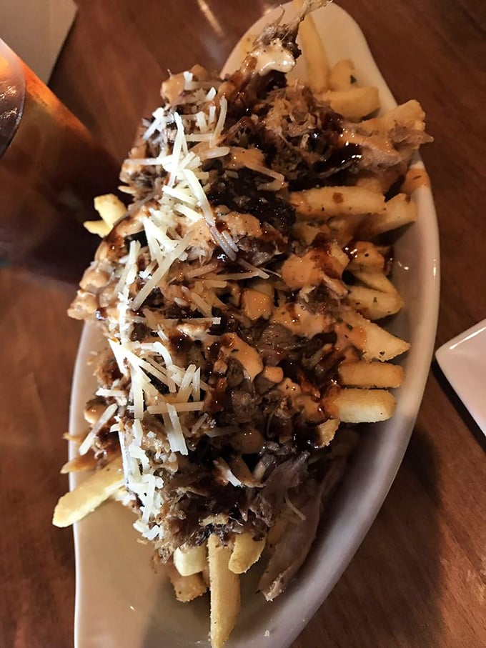 Pulled pork fries that blur the line between appetizer and religious experience&mdash;crispy, savory, and utterly worth the napkin investment.