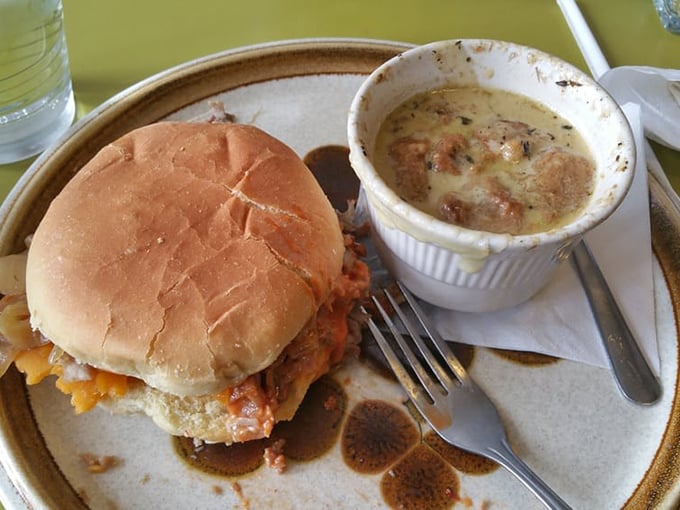 Even the savory options demand attention. This pulled pork sandwich with French onion soup proves Myrtle's isn't just about dessert.