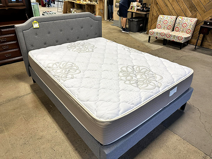 Sweet dreams don't need to cost a fortune. This quality queen bed with upholstered headboard awaits its next sleeping beauty.