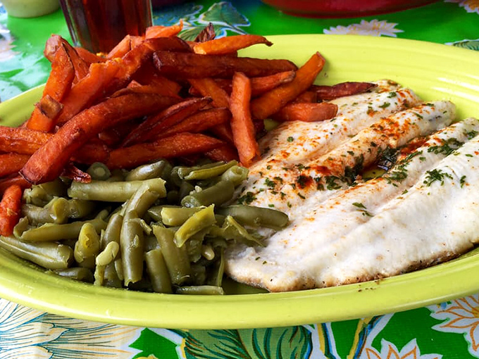 Rainbow trout that actually tastes like it had a life before your plate. Those vibrant vegetables aren't just sides&mdash;they're co-stars.
