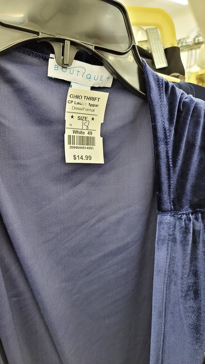 Fashion archaeology at its finest&mdash;this formal dress tag reveals both bargain and boutique origins, the thrifter's equivalent of striking gold.