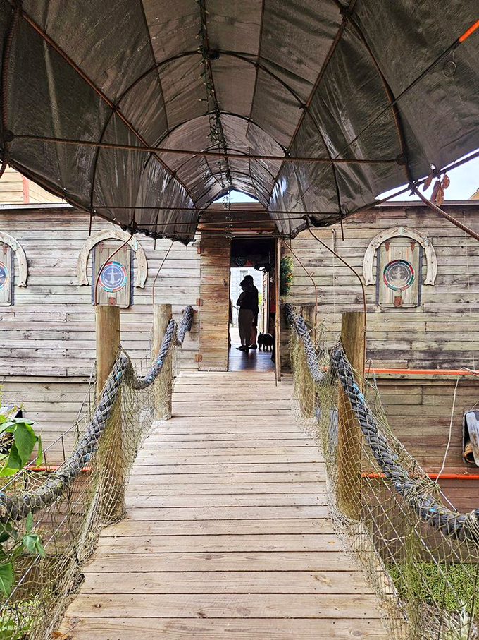 The restaurant entrance beckons with nautical charm. Cross this gangplank and prepare for a meal that's more memorable than the average landlubber fare.