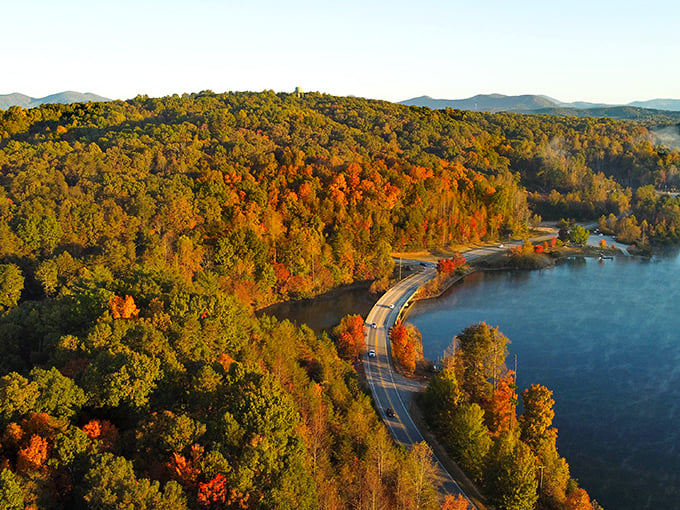Winding roads hug shorelines dappled with autumn's fiery palette, offering drives so scenic you'll forgive yourself for pulling over every quarter mile.