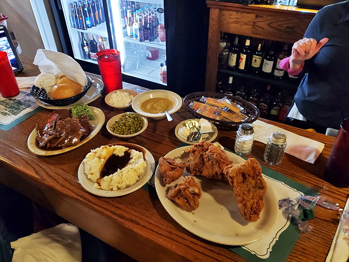 The classic Sunday dinner lineup&mdash;roast beef that falls apart and fried chicken that stays crispy. Comfort food's greatest hits album on one table.