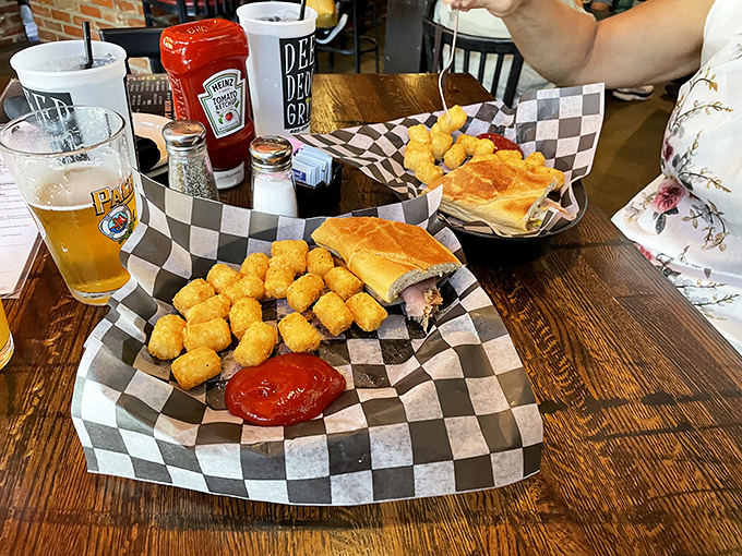 Comfort food geometry: the perfect triangle of sandwich, tots, and dipping sauce. Mathematics never tasted so good.