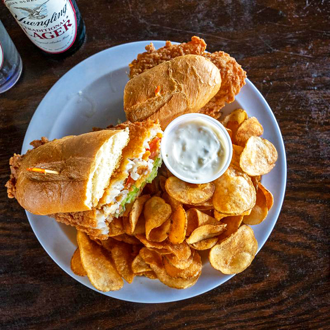 The perfect lunch trinity&mdash;golden bread, crispy chips, and a sandwich that doesn't need Instagram filters to look absolutely stunning.