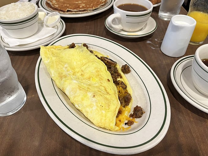 This omelet doesn't just contain cheese and sausage &ndash; it celebrates them in a fluffy yellow package that's worth setting your alarm for.