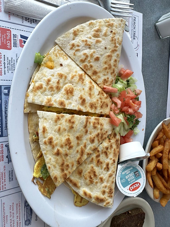 The dessert case&mdash;where willpower goes to die and "I'll just have coffee" turns into "and a slice of that chocolate cake, please." 