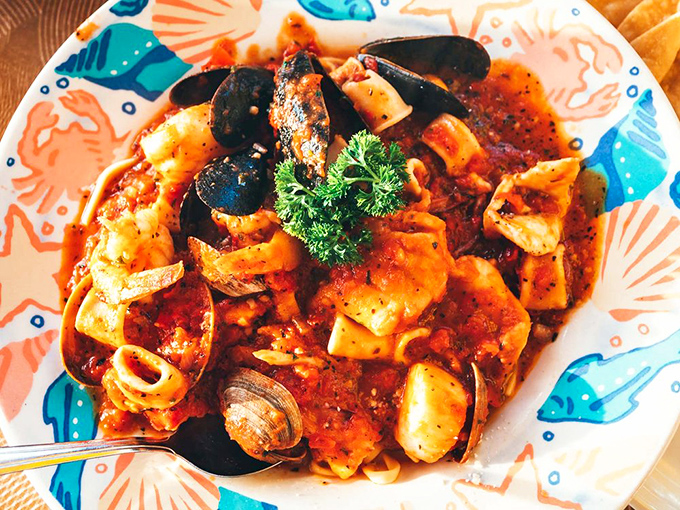 A seafood pasta that would make Italian fishermen nod in approval. Mussels, clams, and fish swimming in a tomato sauce sea&mdash;pasta perfection.