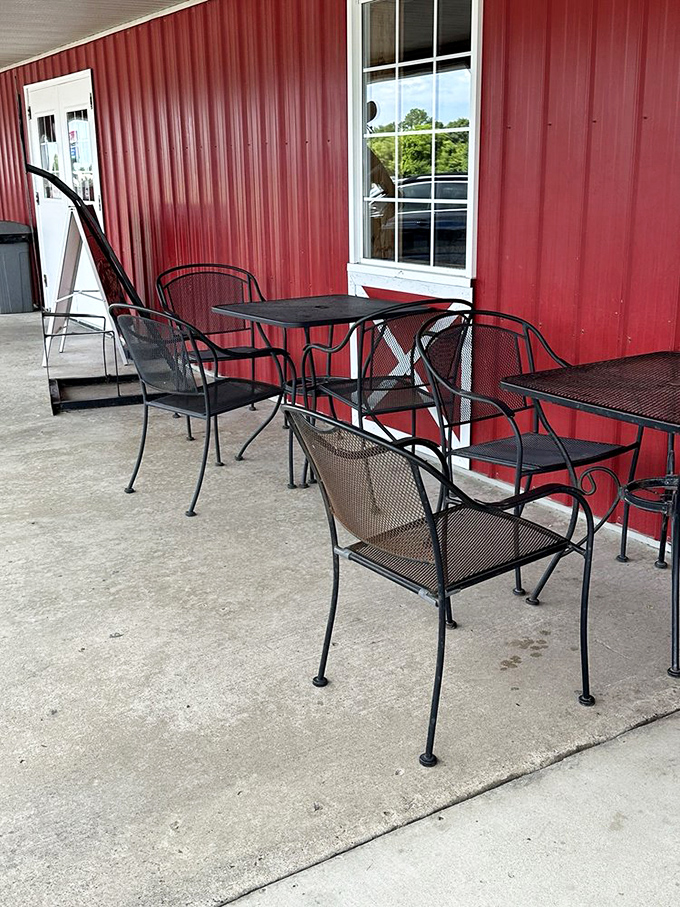 Outdoor seating against the barn's crimson backdrop&mdash;where conversations flow as easily as the Oklahoma breeze. Just add pie and watch time slow down.