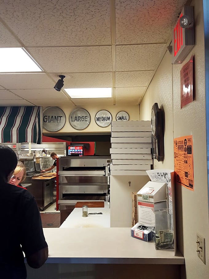 Size matters at Pizza John's, where your only dilemma is deciding between "satisfyingly full" and "delightfully stuffed with leftovers."