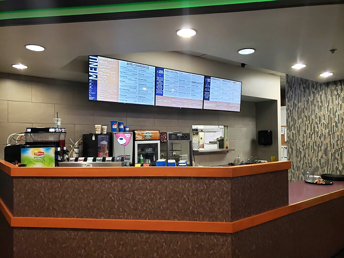 The snack counter&mdash;where bowling legends fuel up on nachos and liquid courage before attempting that impossible 7-10 split.